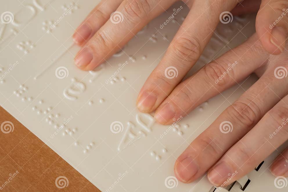 A Woman Learns the Braille Alphabet Using a Decoder. Stock Image ...