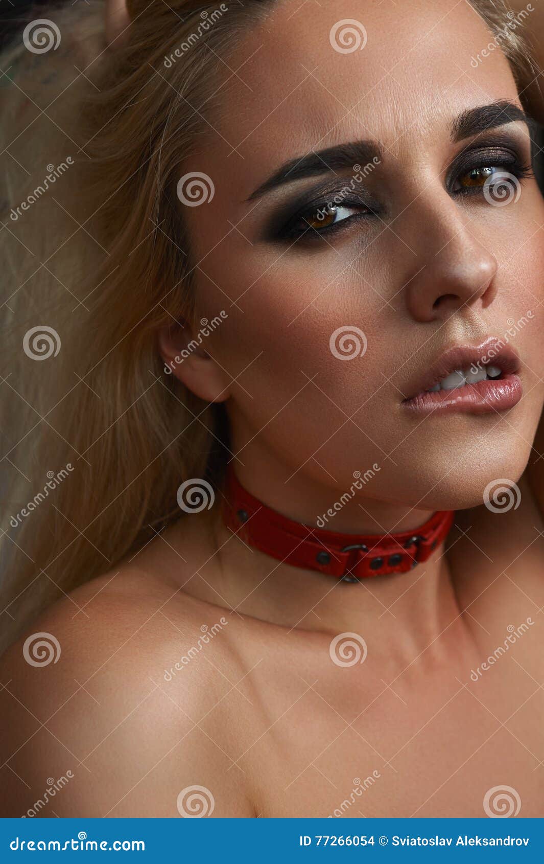 Woman with Leather Collar Biting Lips Stock Photo - Image of lips ...
