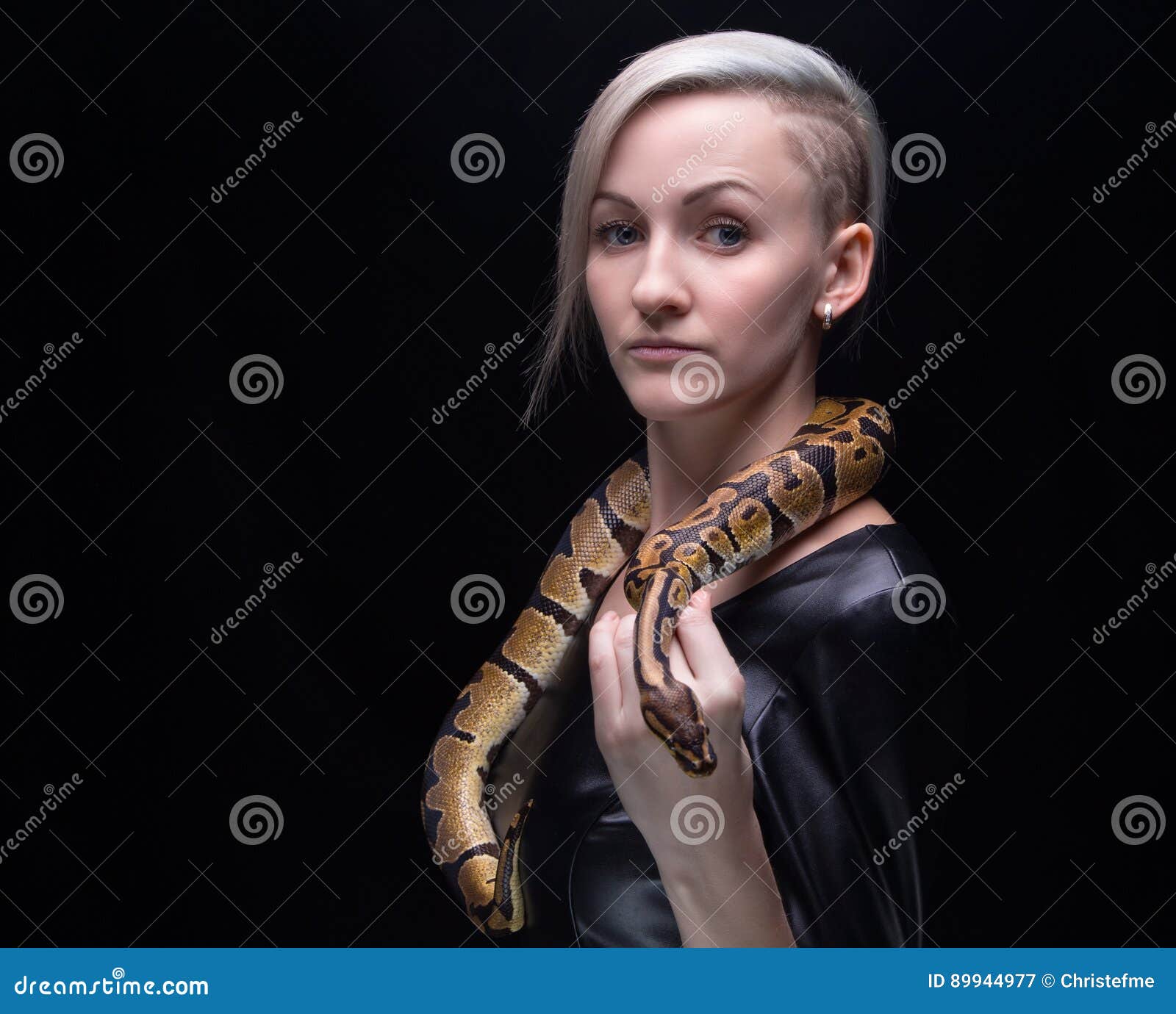 Woman in Leather Dress with Ball Python Stock Image - Image of short ...