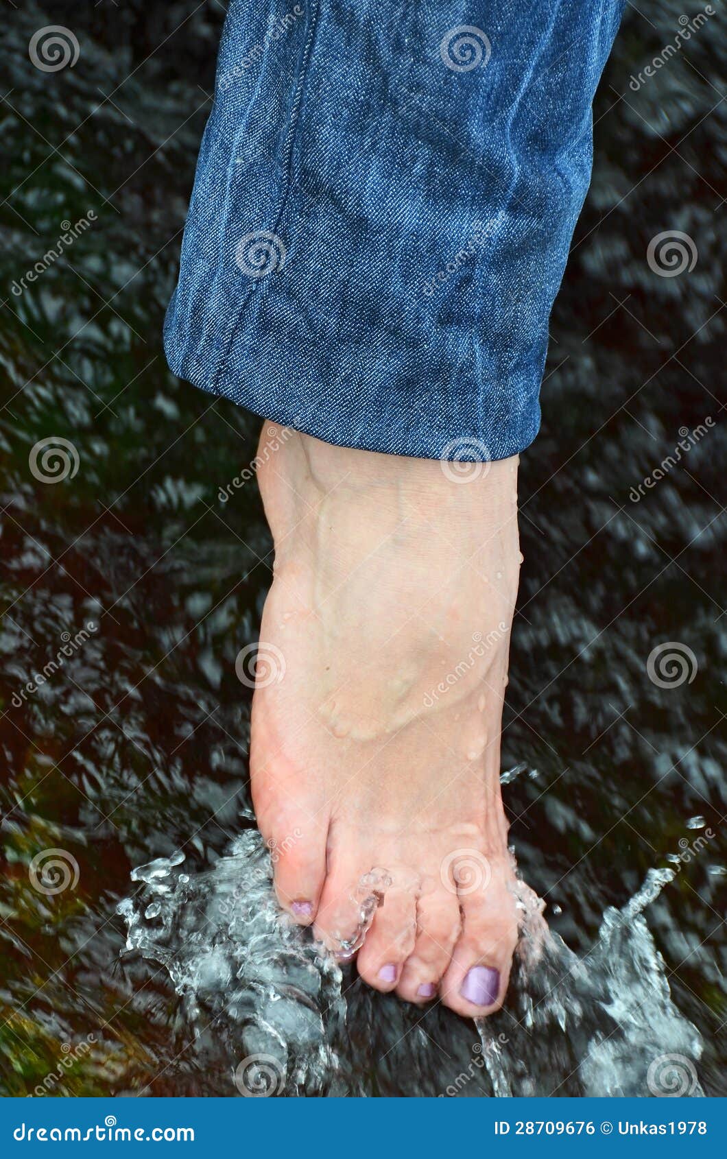 Woman leg in water stock photo. Image of healthy, foot - 28709676