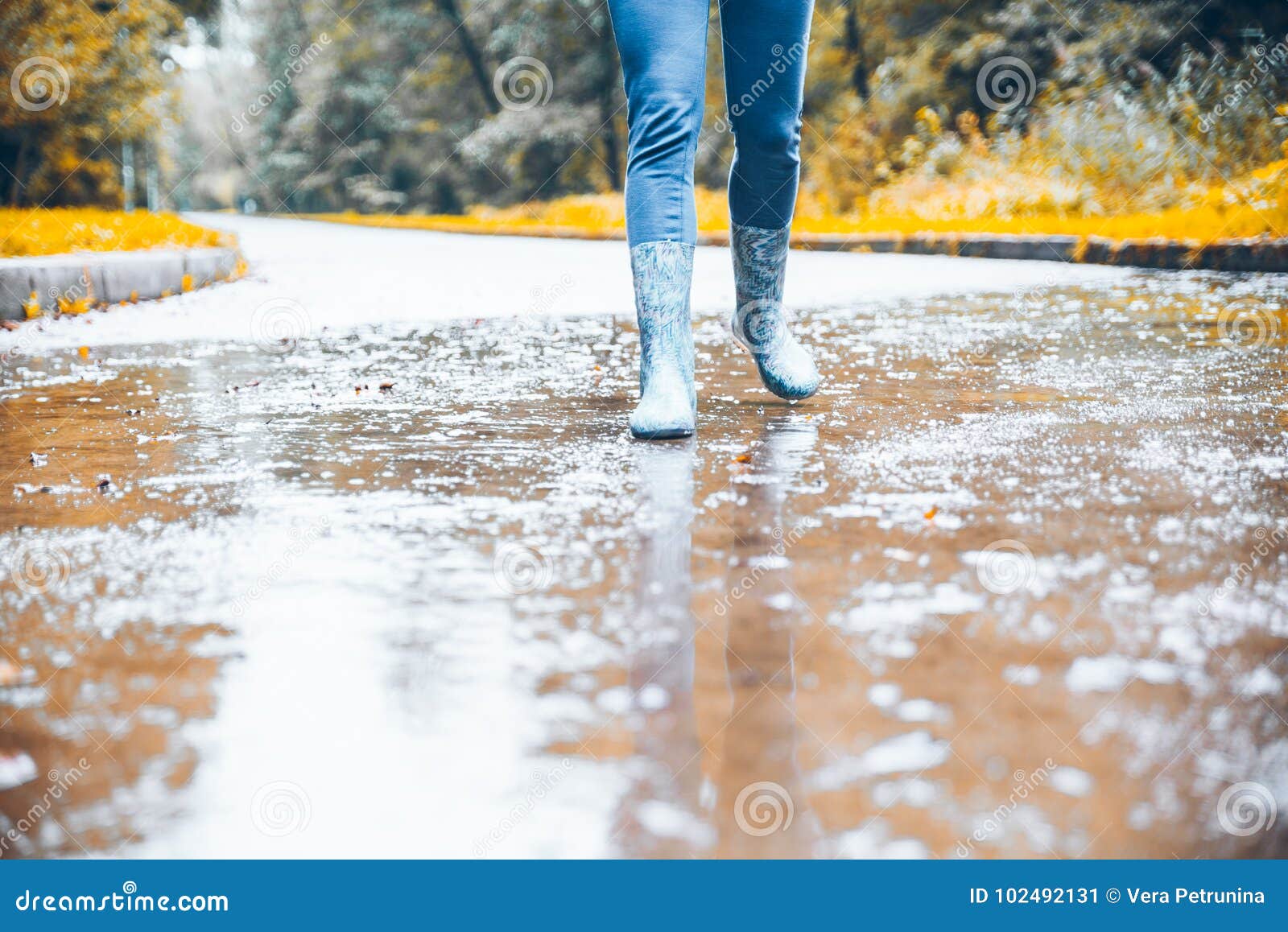 Woman Legs Walking by Puddle Stock Image - Image of drop, person: 102492131