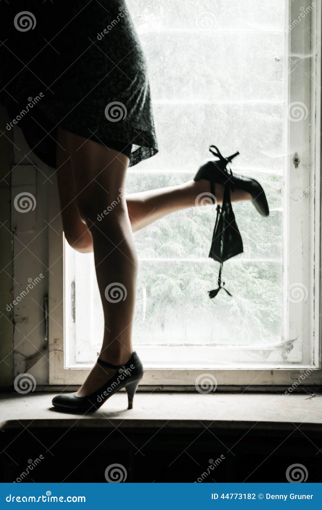 Woman legs on the window stock photo. Image of light - 44773182
