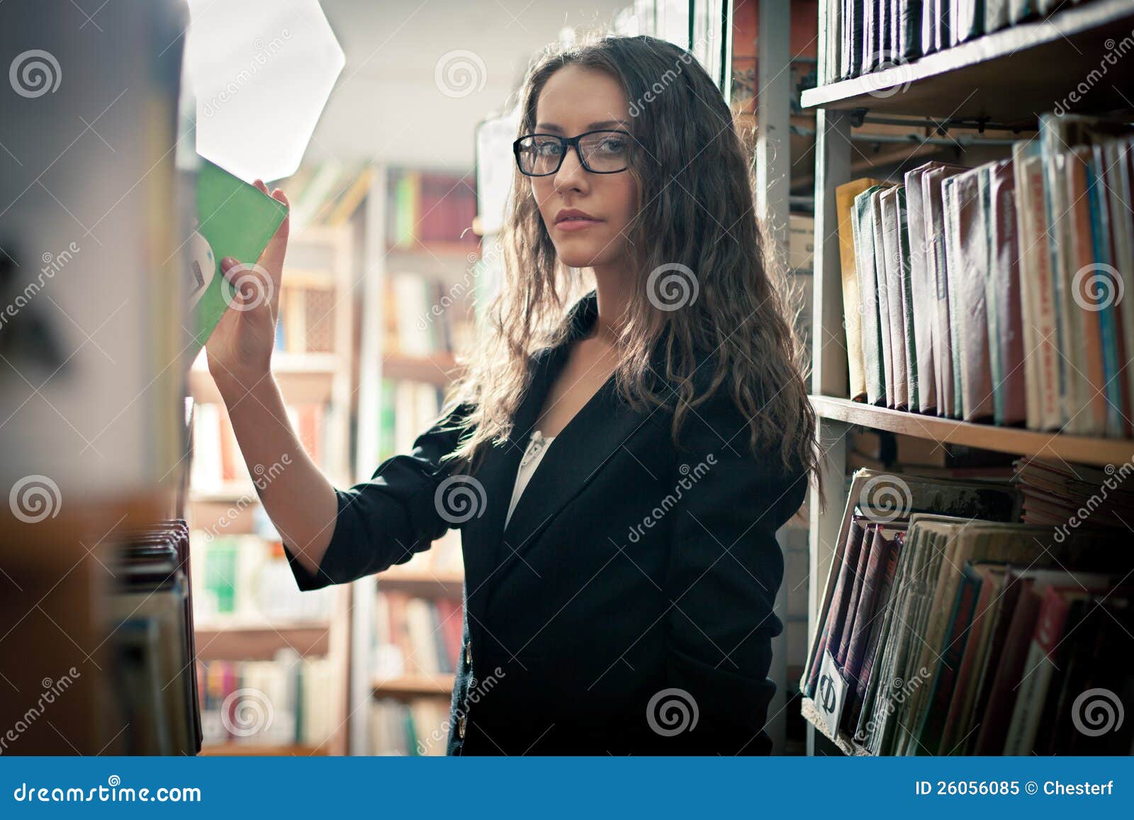 Woman at library stock image. Image of books, bookshelves - 26056085