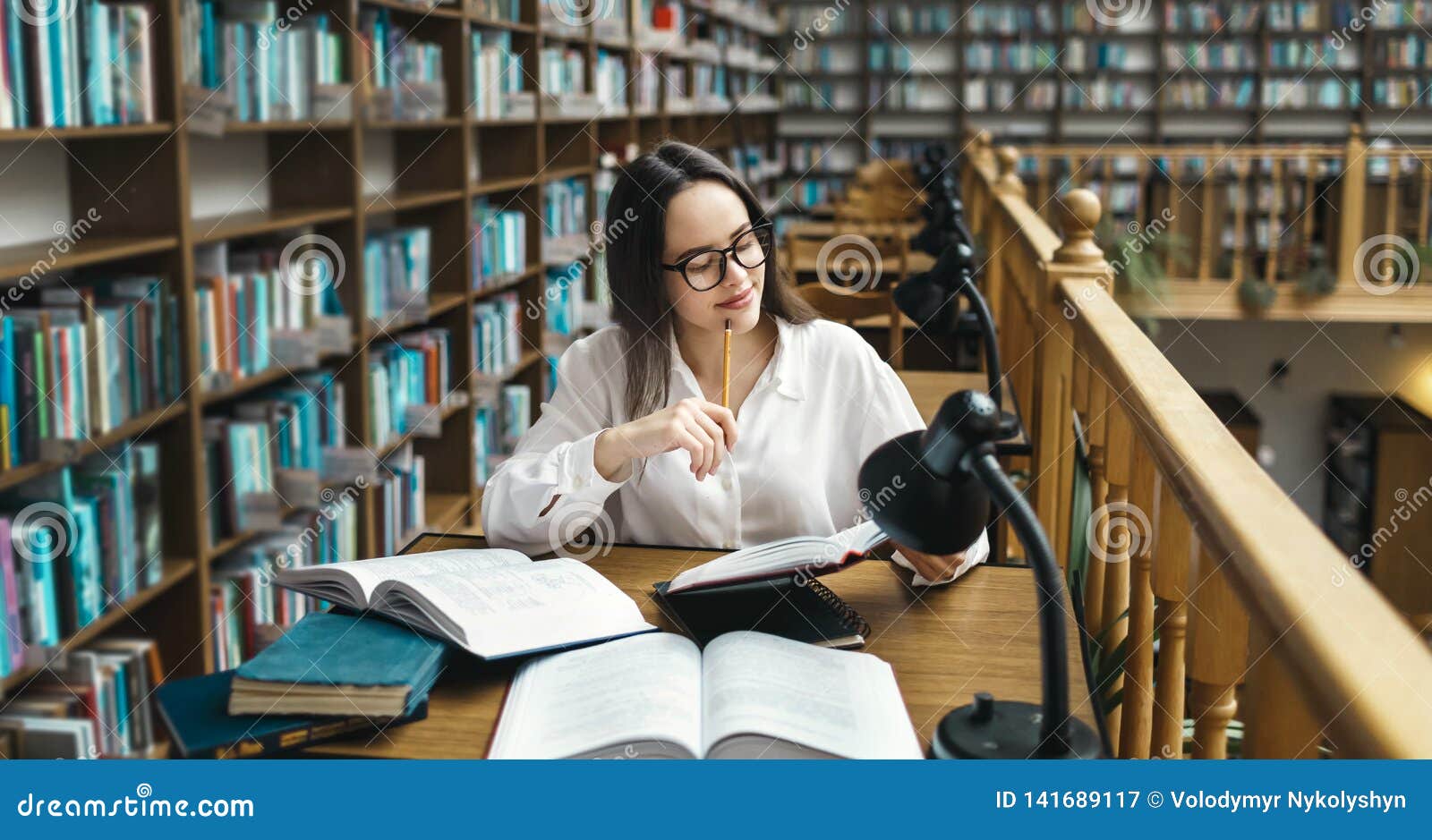 Student Studying at the Library Stock Image - Image of girl, studying ...