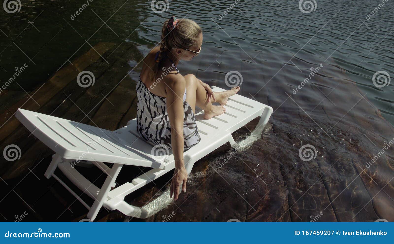 Woman Lie On A Sunbed In Sunglasses And A Boho Silk Shawl Girl Rest On