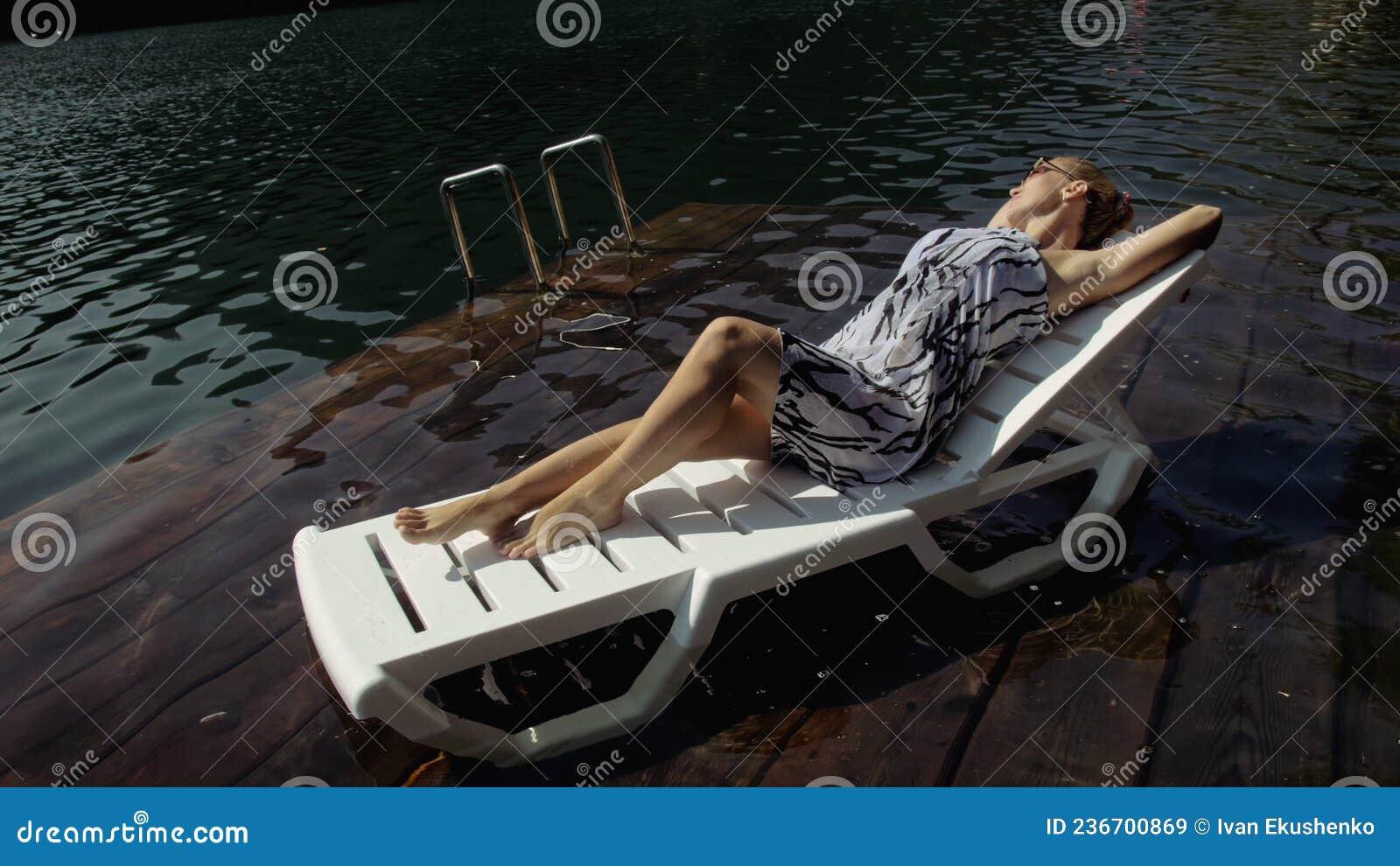Woman Lie On A Sunbed In Sunglasses And A Boho Silk Shawl Girl Rest On