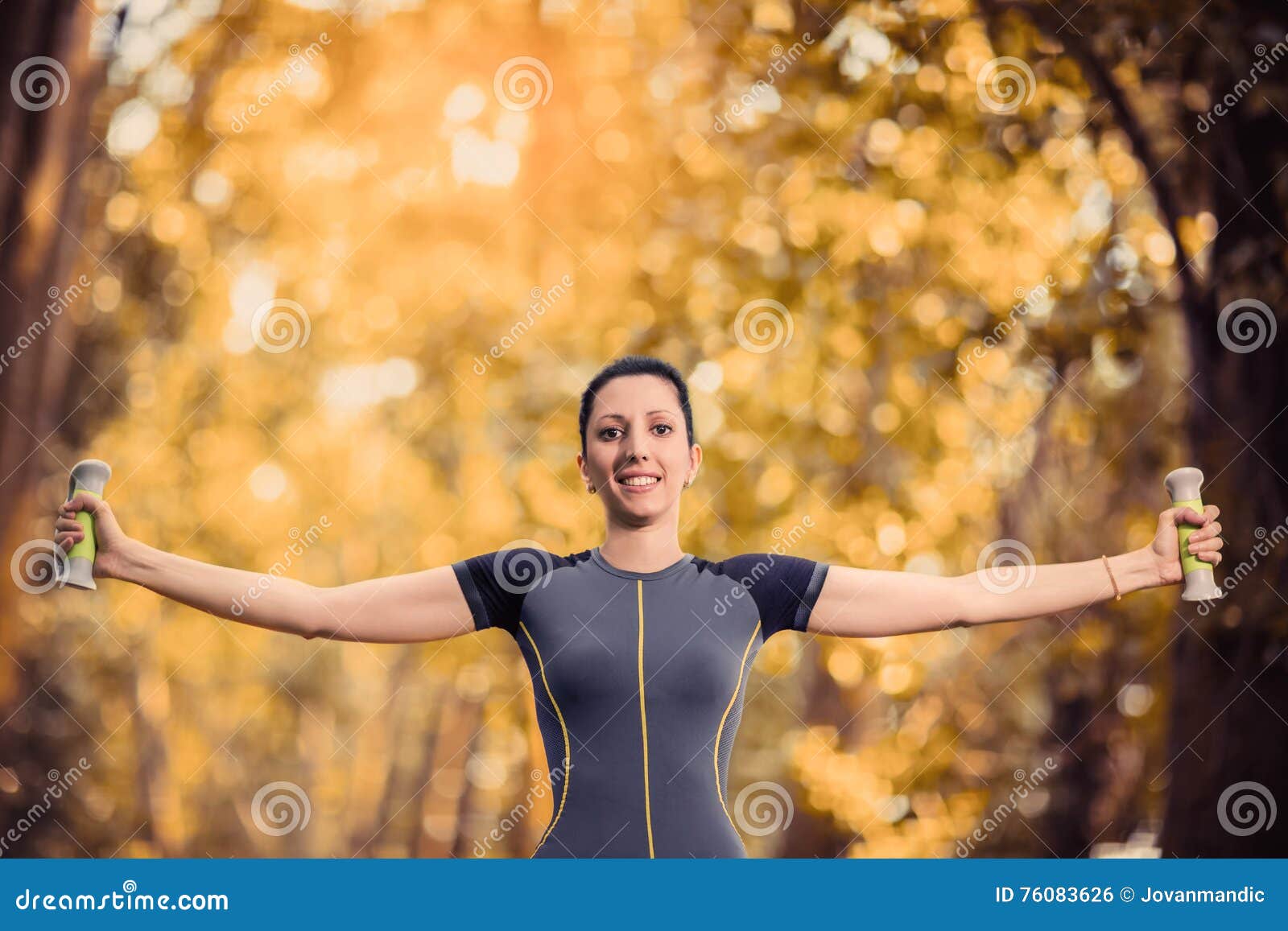 Woman Lifting Small Weights in the Park Stock Photo - Image of leisure ...