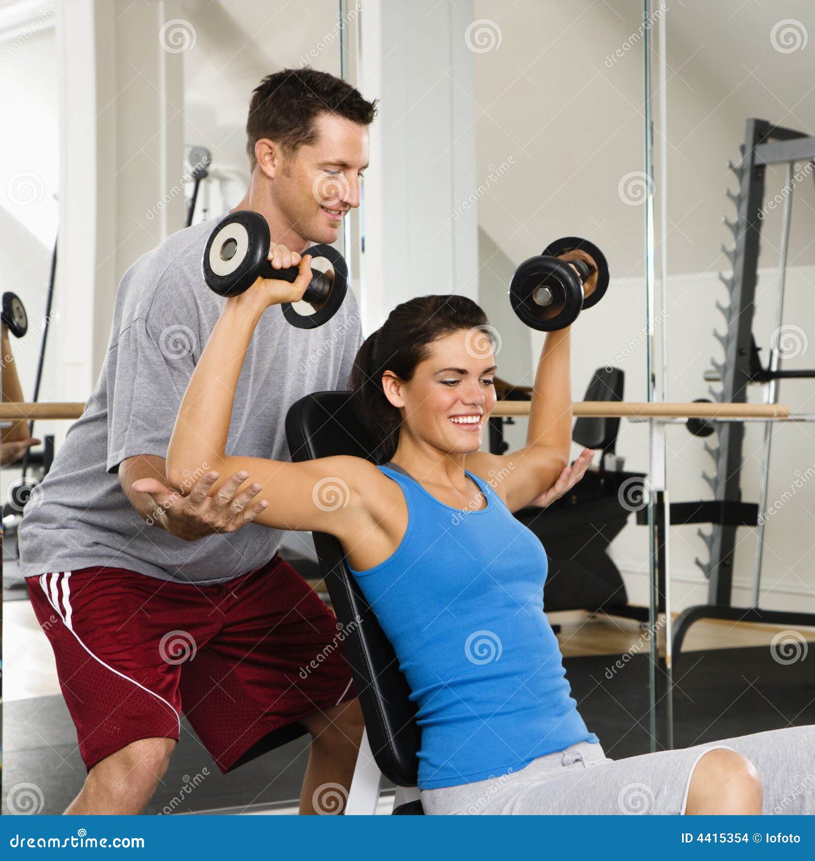 Woman lifting weights stock photo. Image of photograph - 4415354