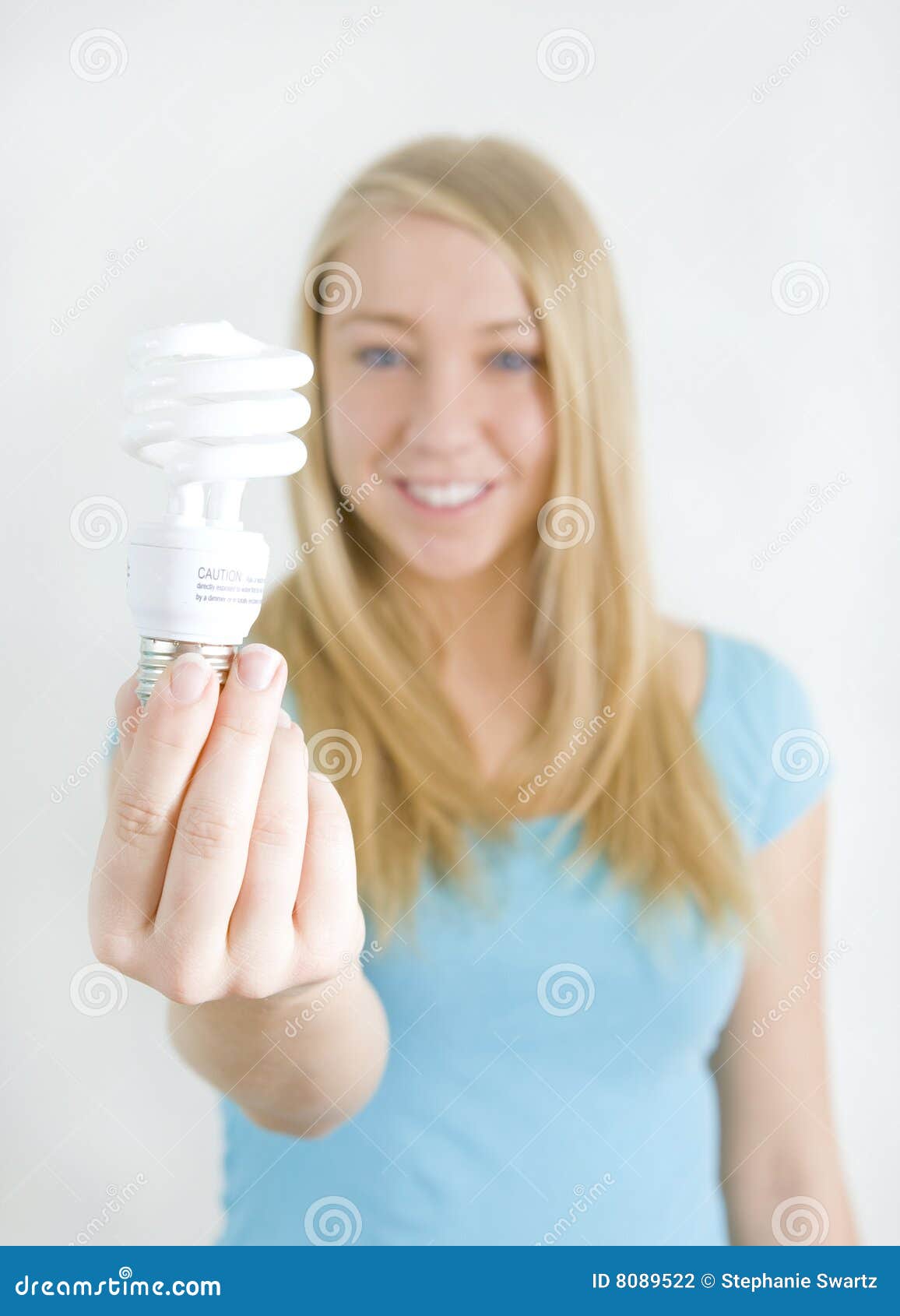 Woman and light bulb stock photo. Image of efficient, close - 8089522