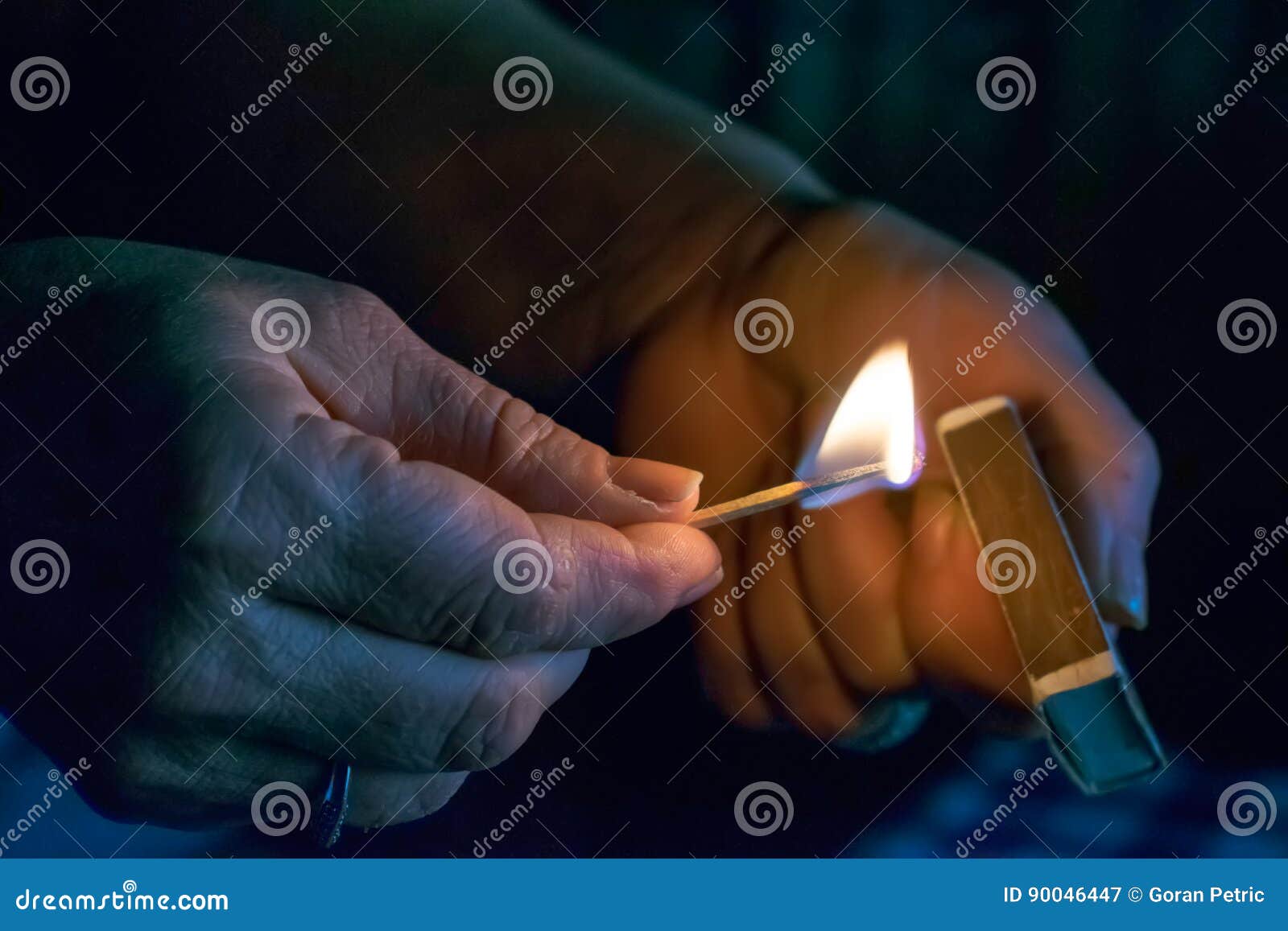 The Woman Lights a Match, Fire from a Match. Stock Image - Image of ...