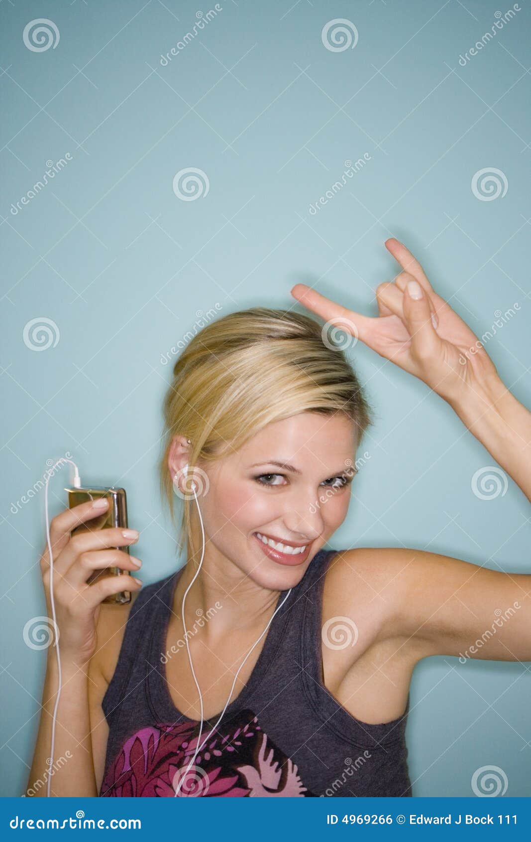Woman Listening To MP3 Player Stock Photo - Image of head, listening ...