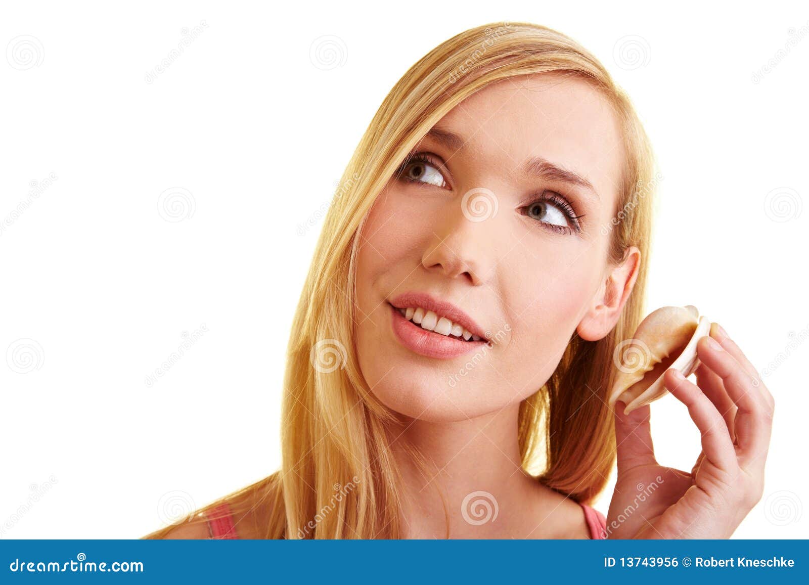 Woman listening to a shell stock photo. Image of hobby - 13743956