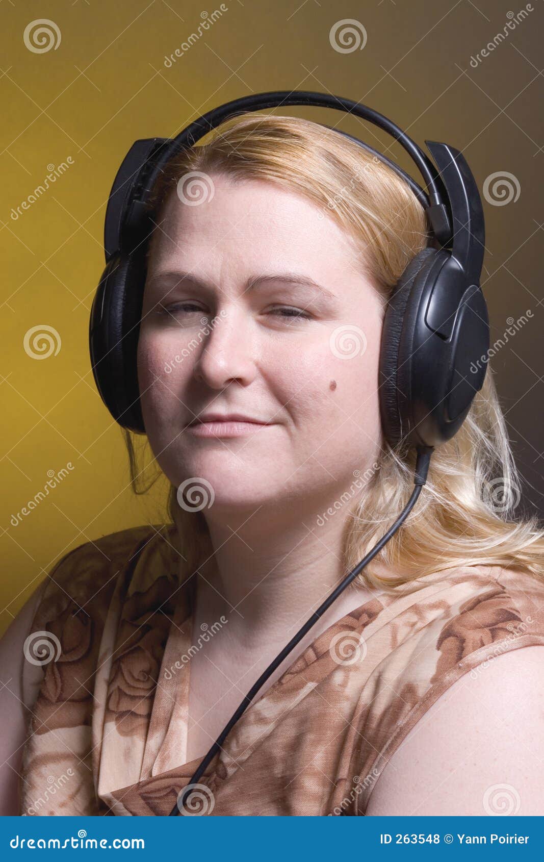 Woman listing to music stock photo. Image of blond, headphones - 263548
