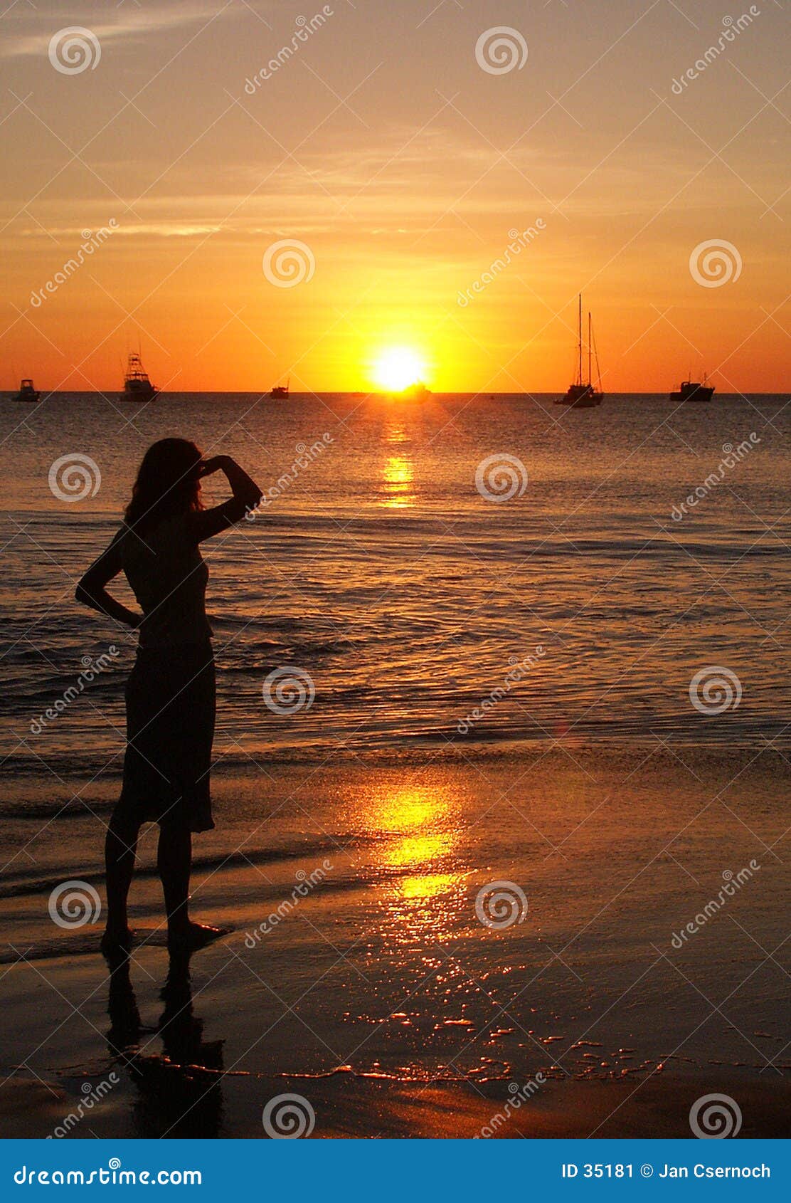 Woman Lit by the Setting Sun Stock Image - Image of waves, seaside: 35181