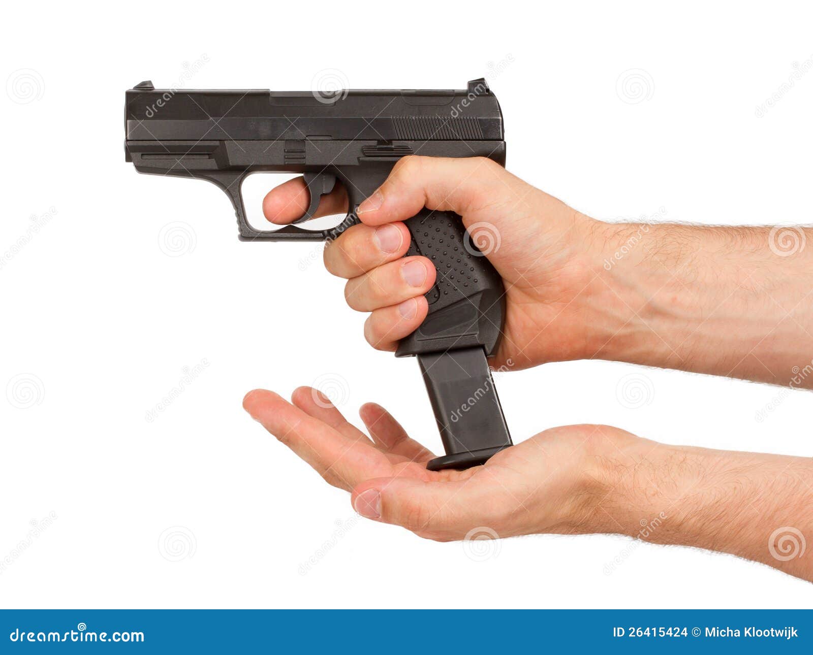 Woman loading a black gun stock photo. Image of action - 26415424