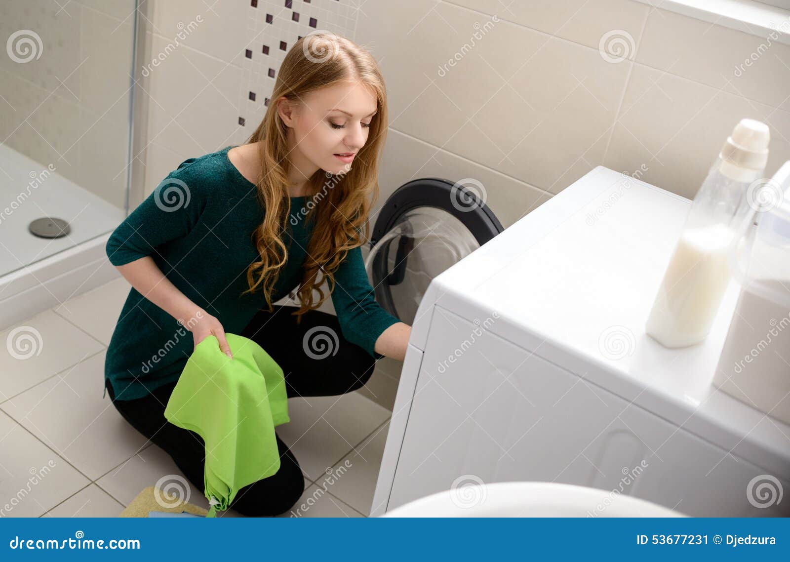 Woman Loading Clothes into Washing Machine Stock Image - Image of house ...