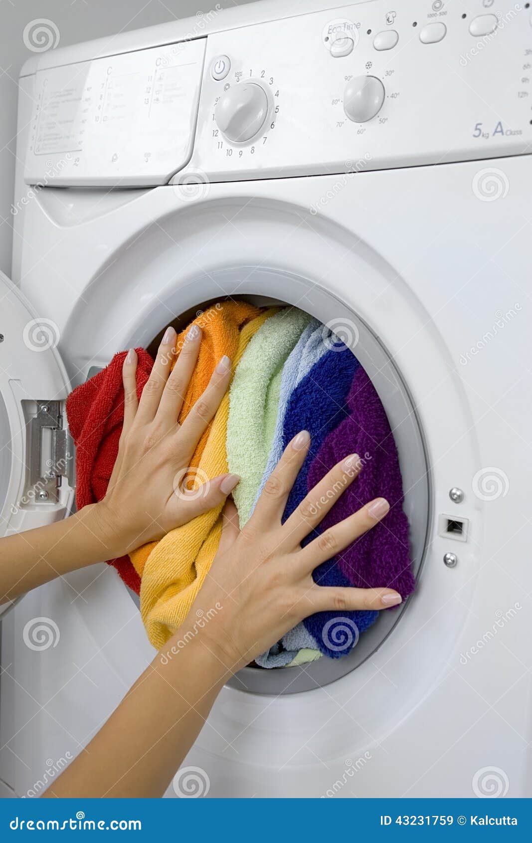 Woman Loading Laundry in the Washing Machine Stock Image - Image of ...