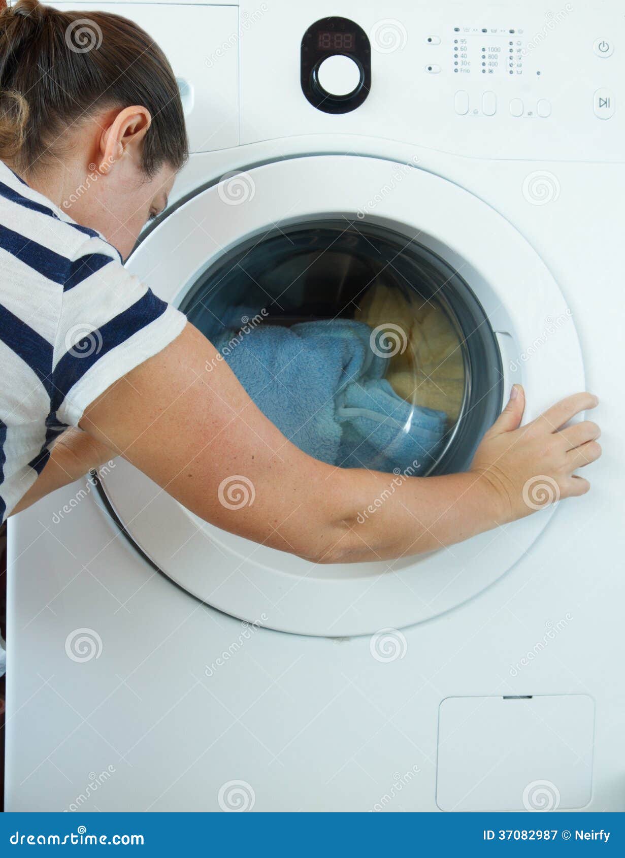 Woman loading laundry stock image. Image of laundry, dirty - 37082987