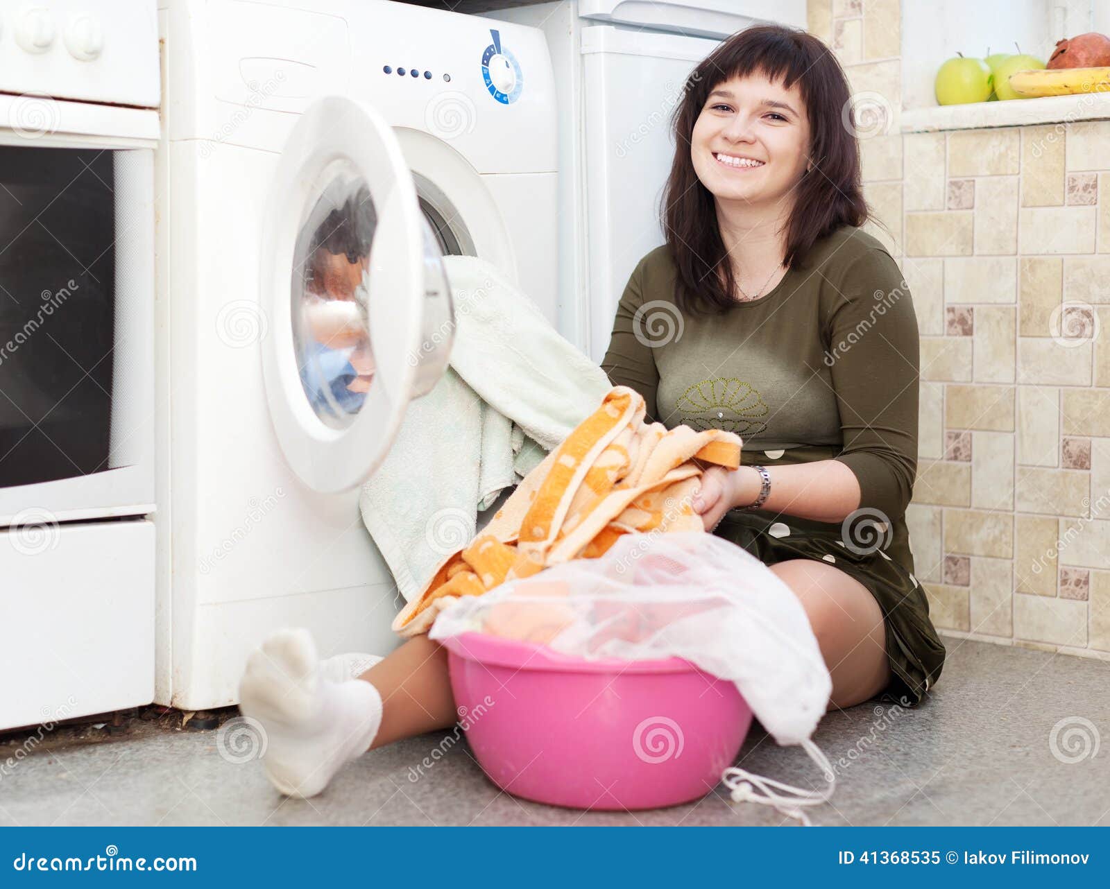 Woman Loading the Washing Machine Stock Image - Image of laundry ...