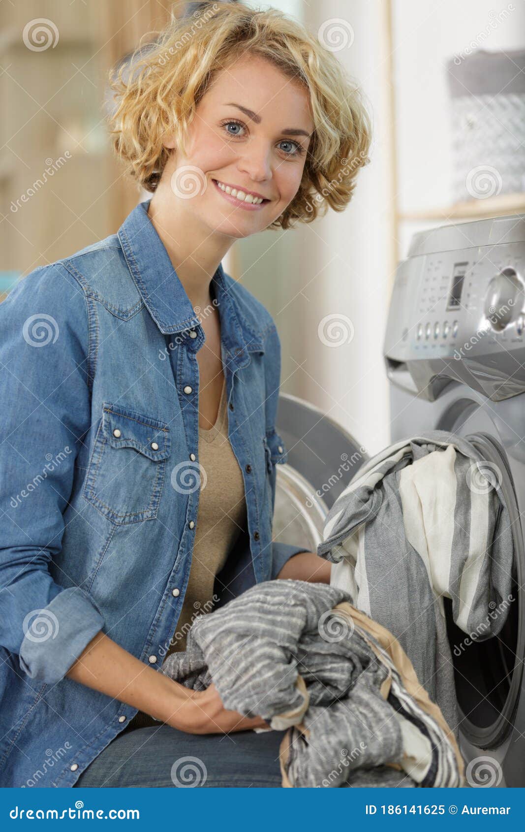 Woman Loading Washing Machine Stock Image - Image of housework ...