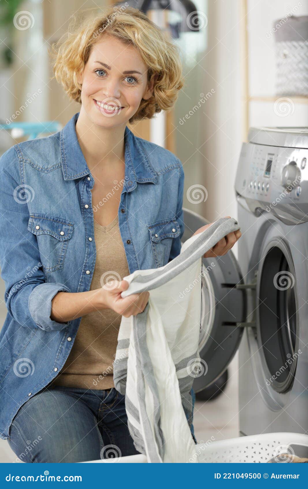 Woman Loading Washing Machine Stock Photo - Image of clean, casual ...