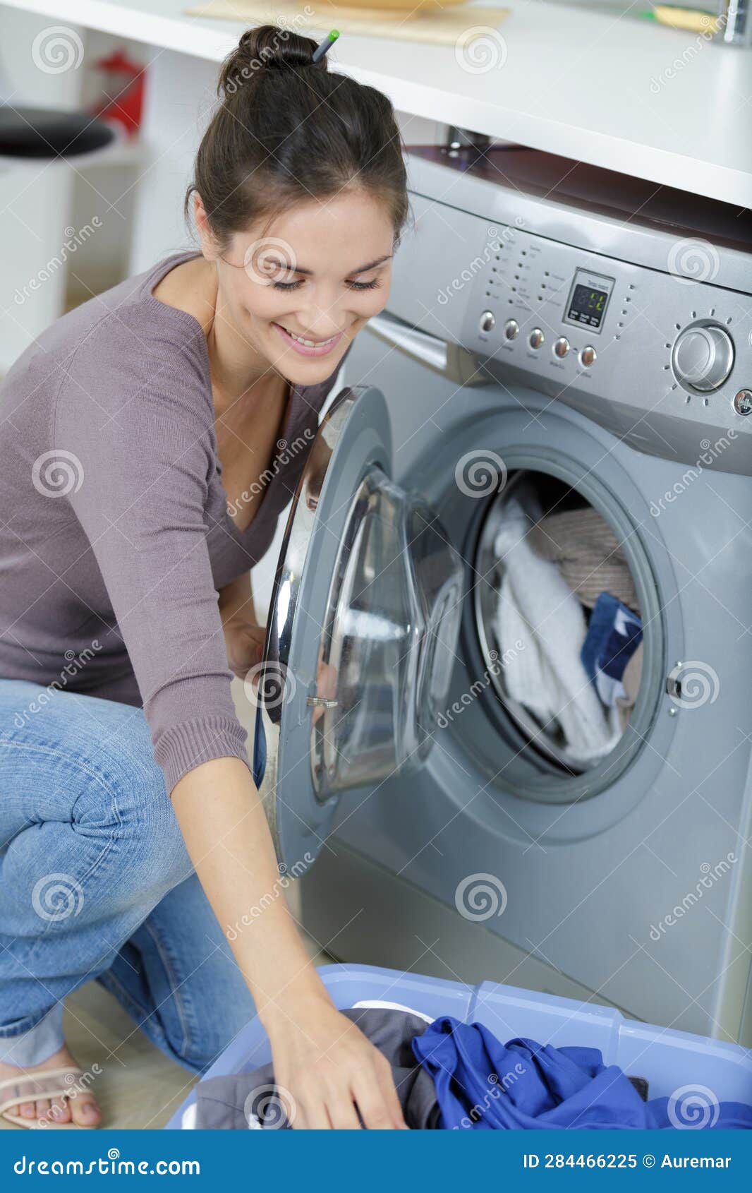 Woman Loading Washing Machine Stock Image - Image of cloth, house ...