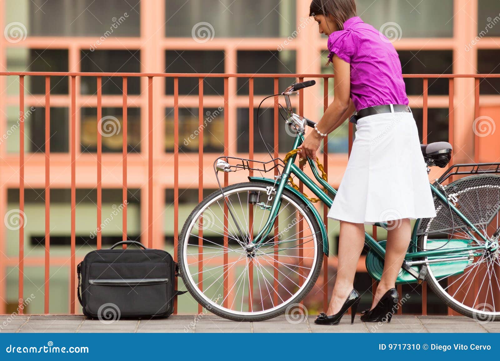 Woman locking padlock stock photo. Image of buildings - 9717310