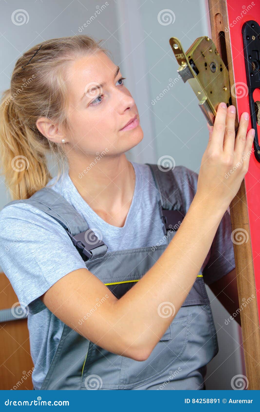 Woman Locksmith Doing Repair Stock Image - Image of system ...