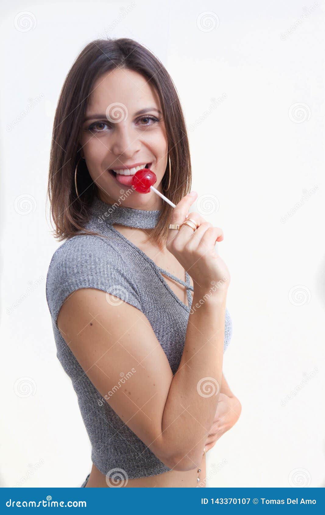 Woman with a lollipop stock image. Image of pretty, girl - 143370107