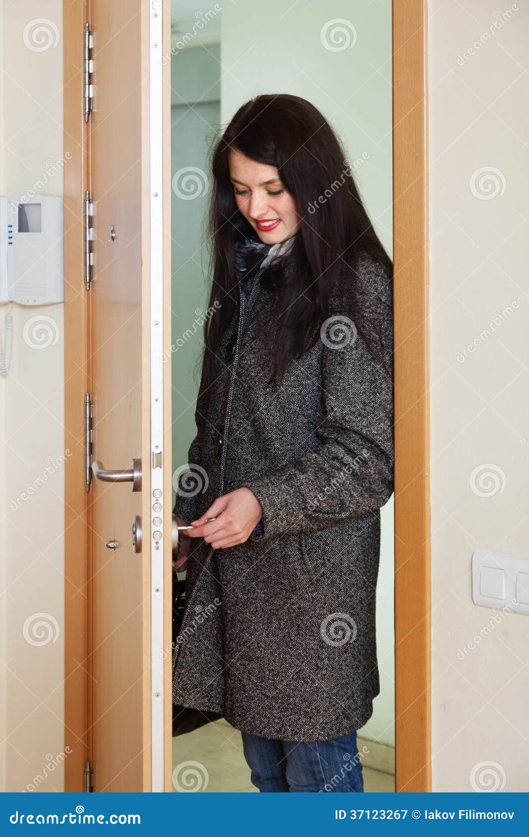 Woman loocking door lock stock image. Image of people - 37123267