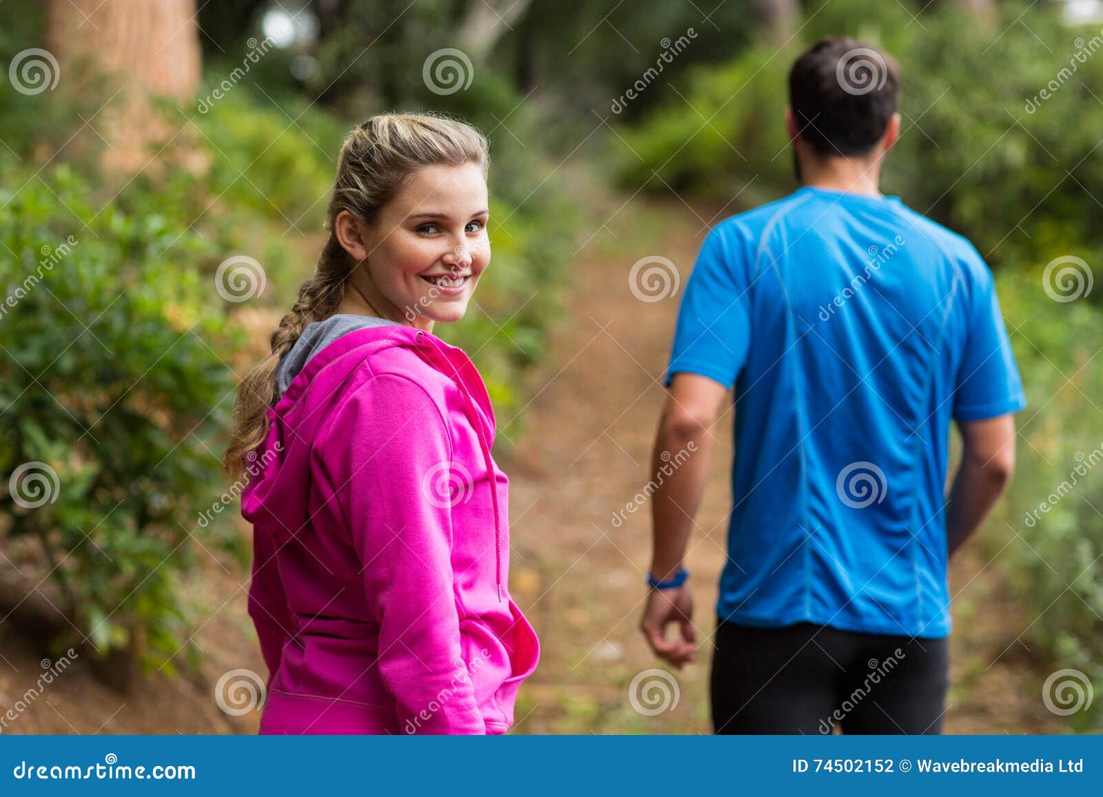 Woman Looking Back while Taking Walk Stock Photo - Image of camera ...