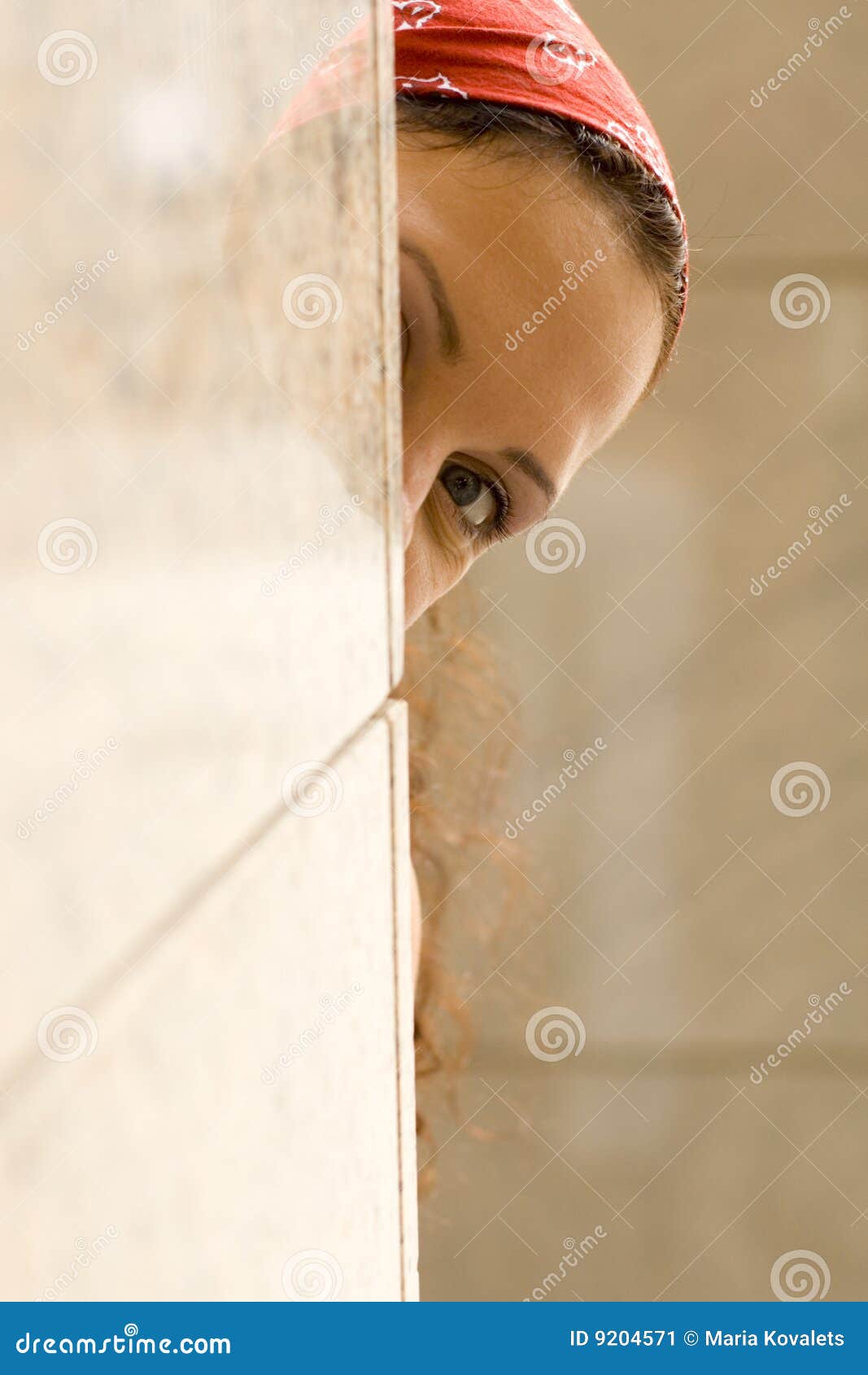 Woman Looking Behind a Wall Stock Image - Image of beauty, head: 9204571