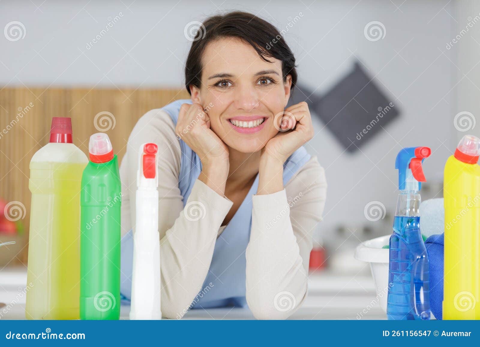 Woman Looking at Camera with Cleaning Products Stock Image - Image of ...