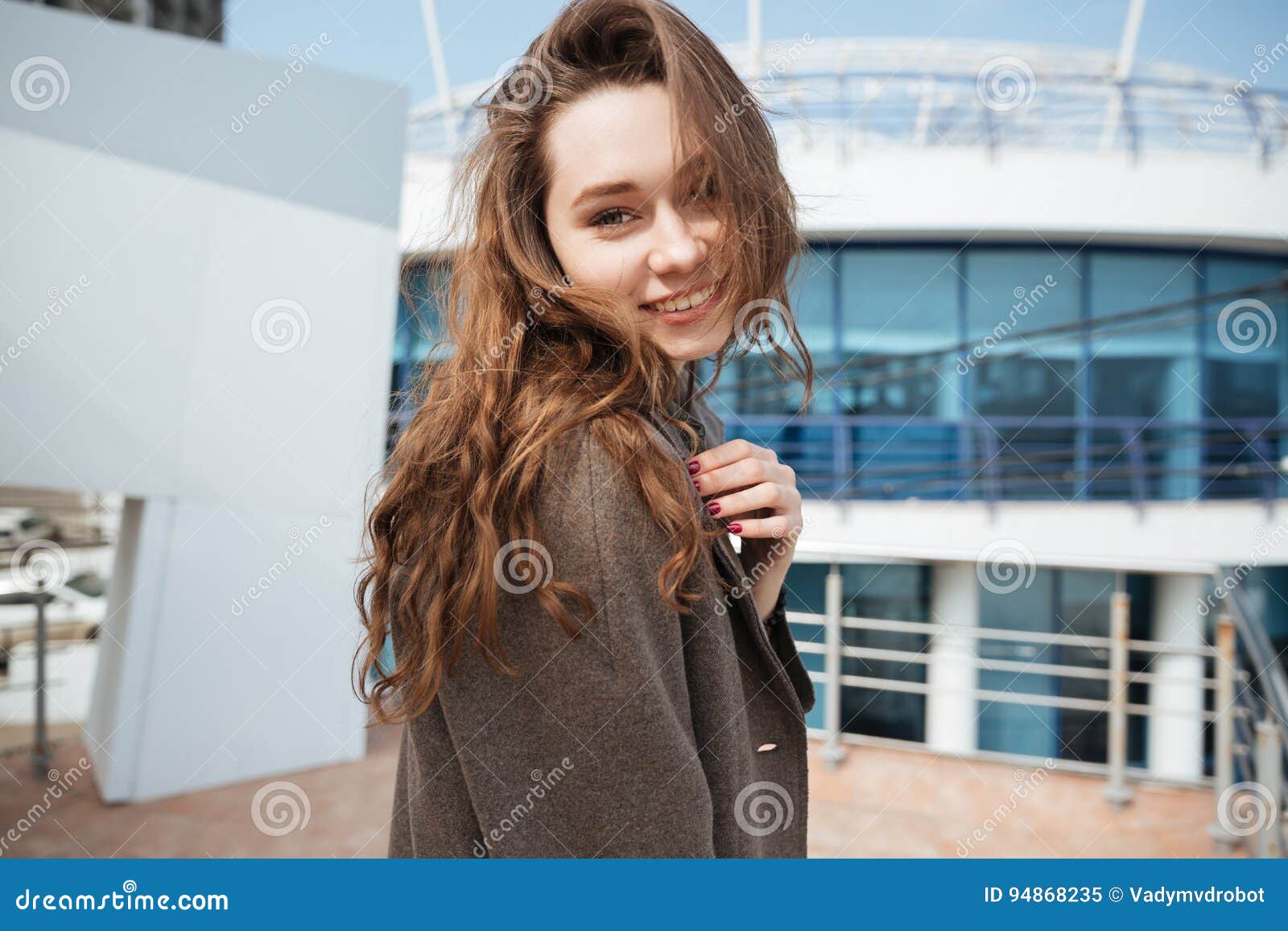 Woman looking camera stock image. Image of outdoor, elegant - 94868235
