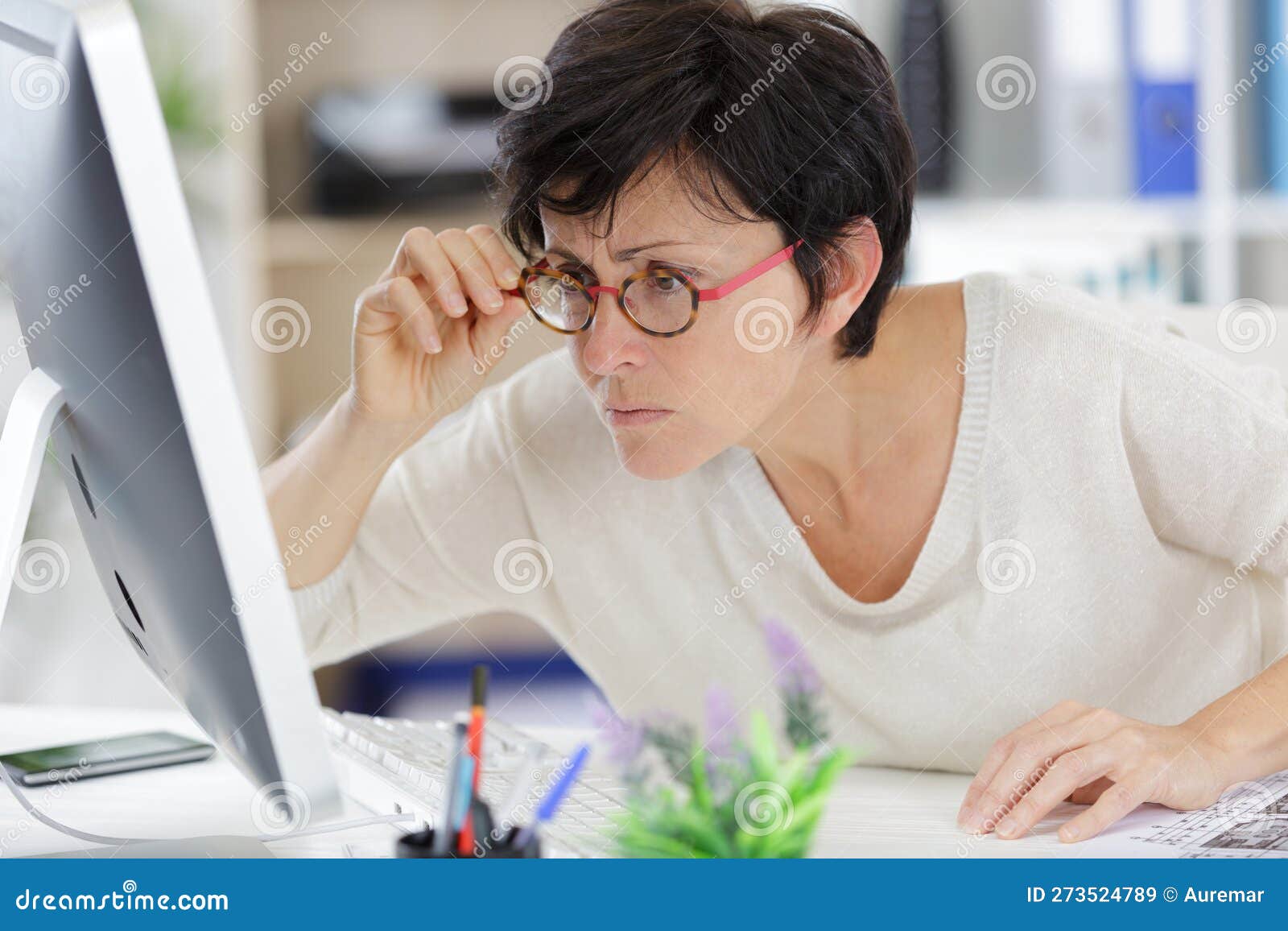 Woman Looking Closely at Computer Screen Stock Image - Image of ...