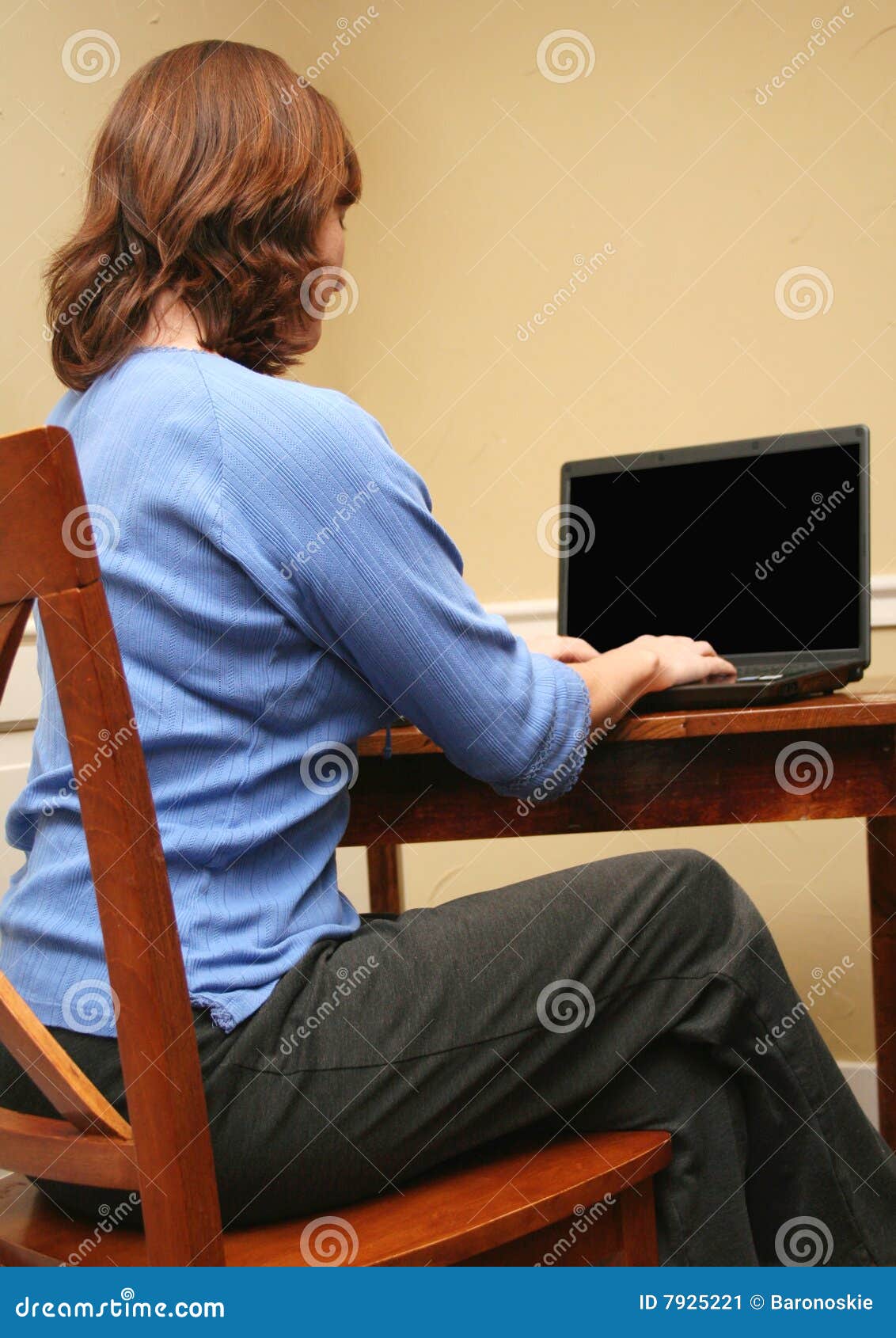 Woman Looking at Computer stock image. Image of casual - 7925221