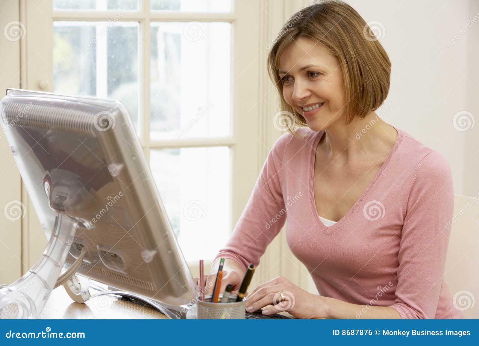 Woman Looking at Computer Screen Stock Photo - Image of comunication ...