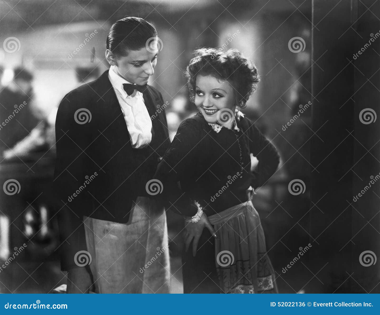 Woman Looking Coy at a Young Man Stock Photo - Image of contact ...