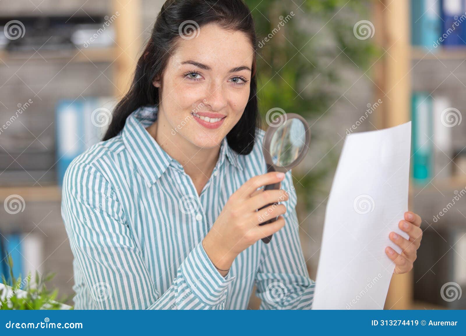 Woman Looking at Document through Magnifying Glass Stock Image - Image ...