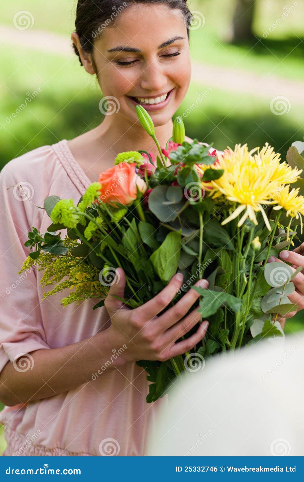 Woman looking at flowers stock photo. Image of lifestyle - 25332746