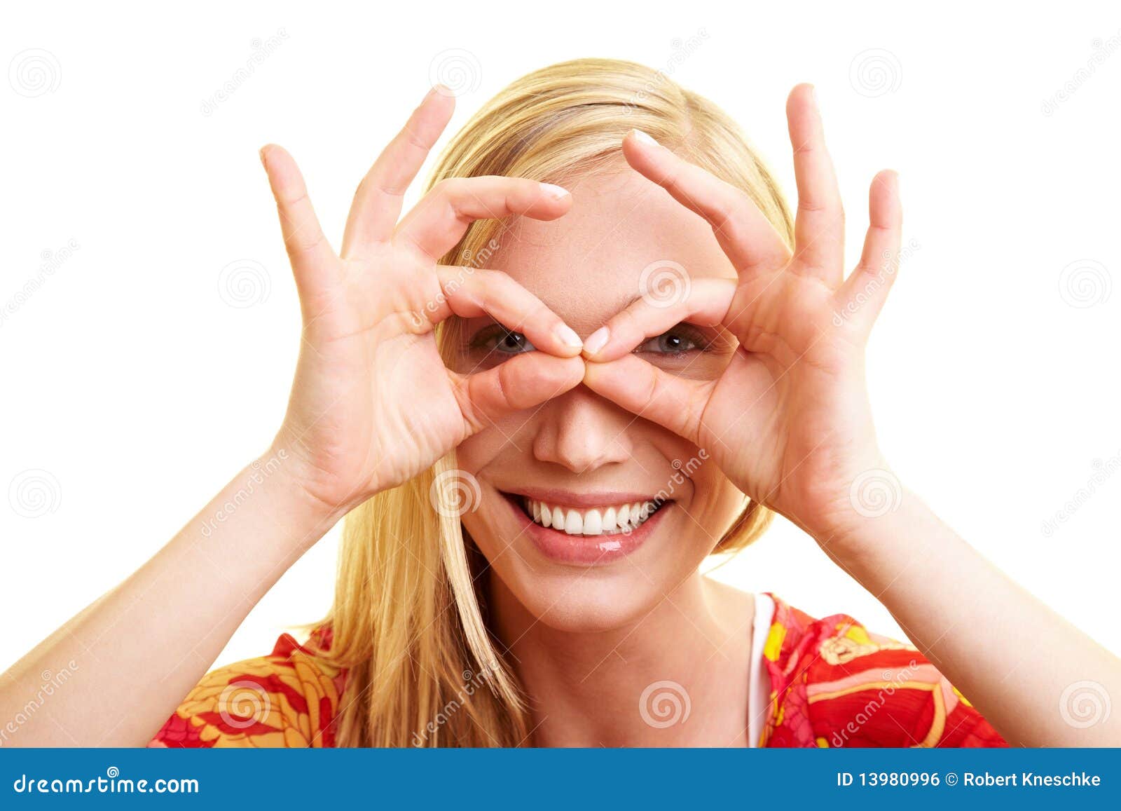 Woman Looking through Her Fingers Stock Photo - Image of cutout, grin ...