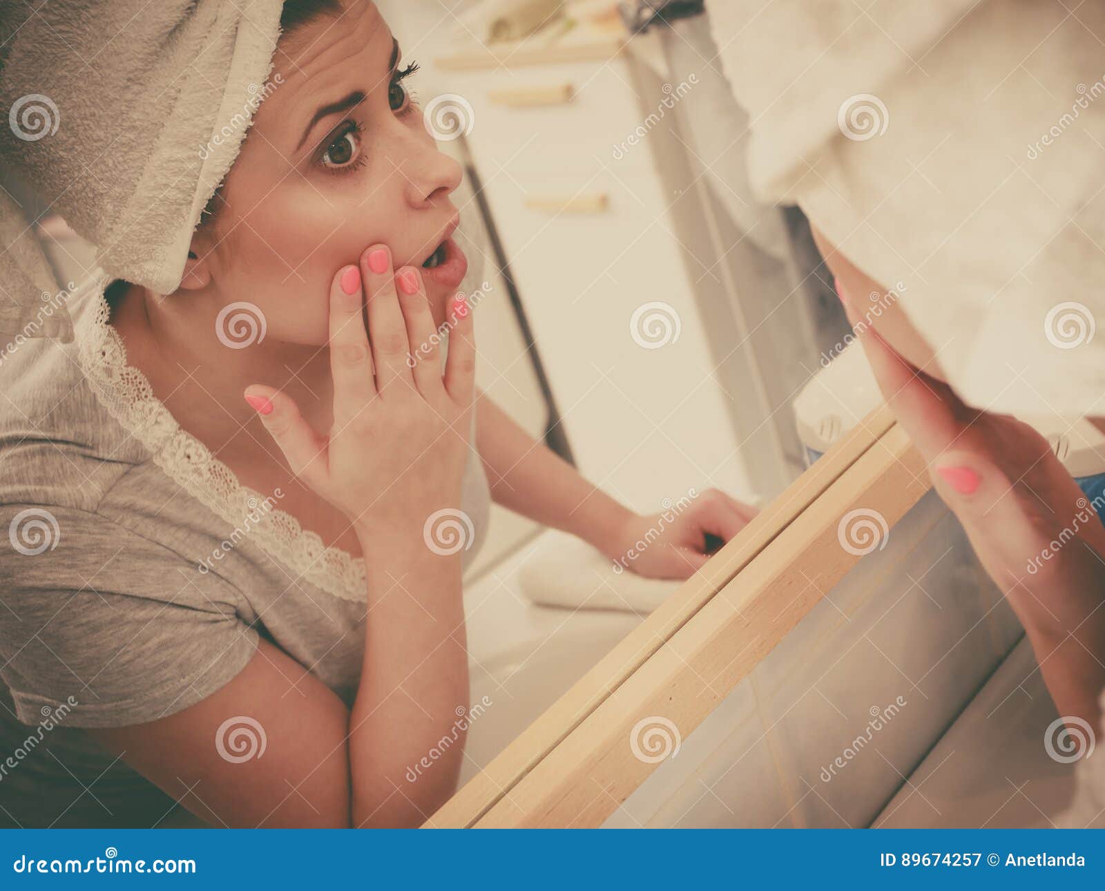 Woman Looking at Her Reflection in Mirror Stock Image - Image of ...