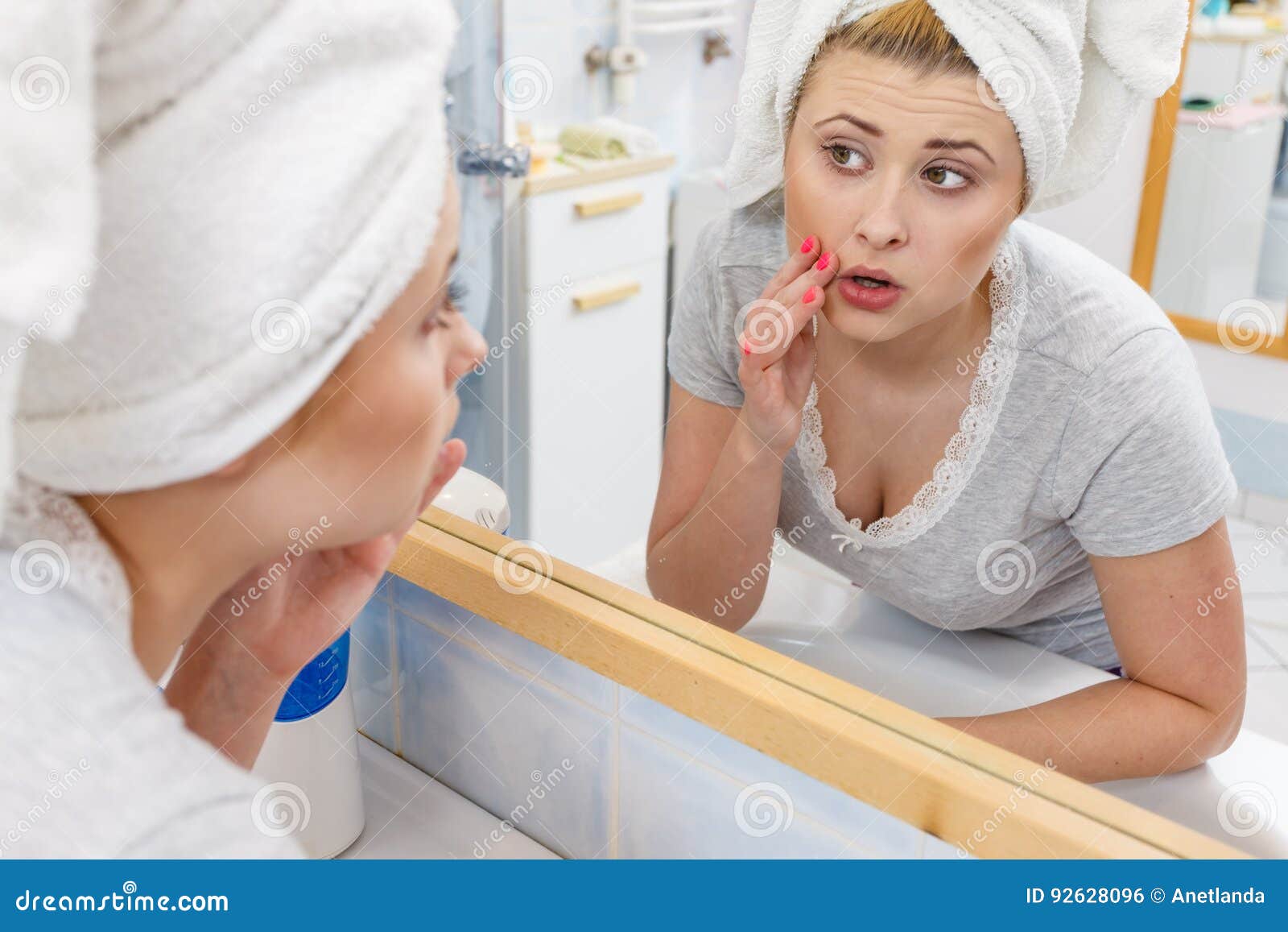 Woman Looking at Her Reflection in Mirror Stock Photo - Image of ...
