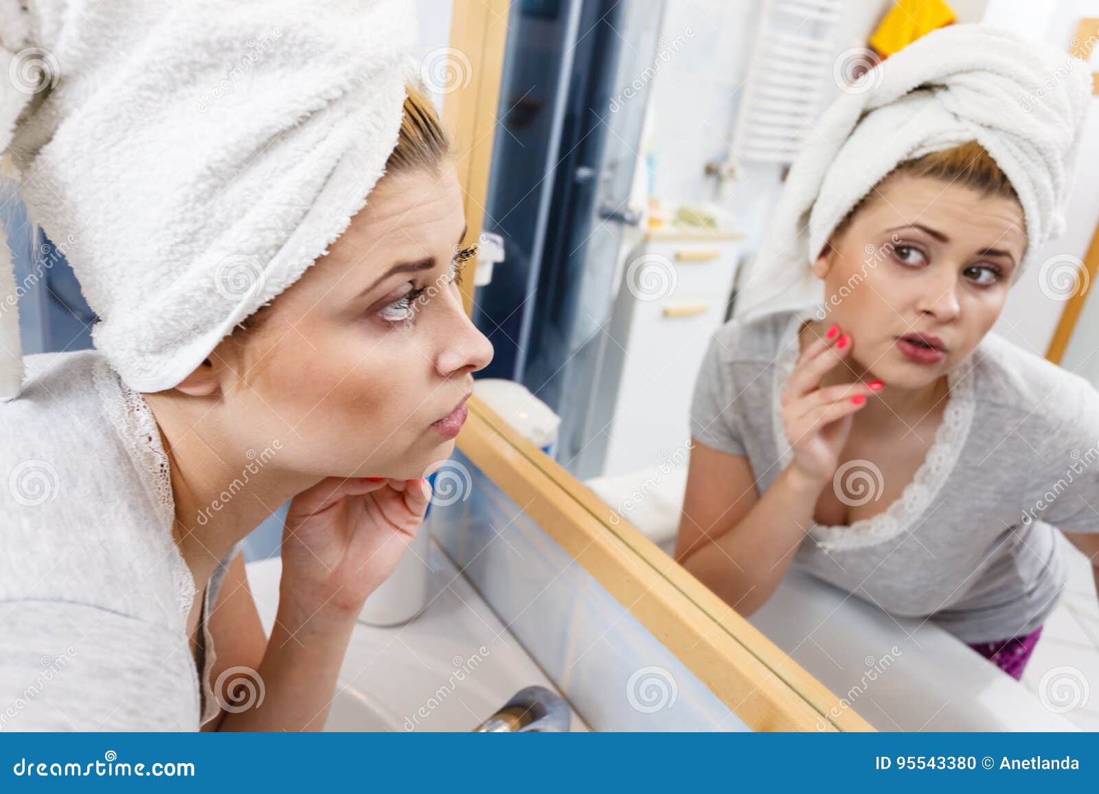 Woman Looking at Her Reflection in Mirror Stock Photo - Image of shock ...