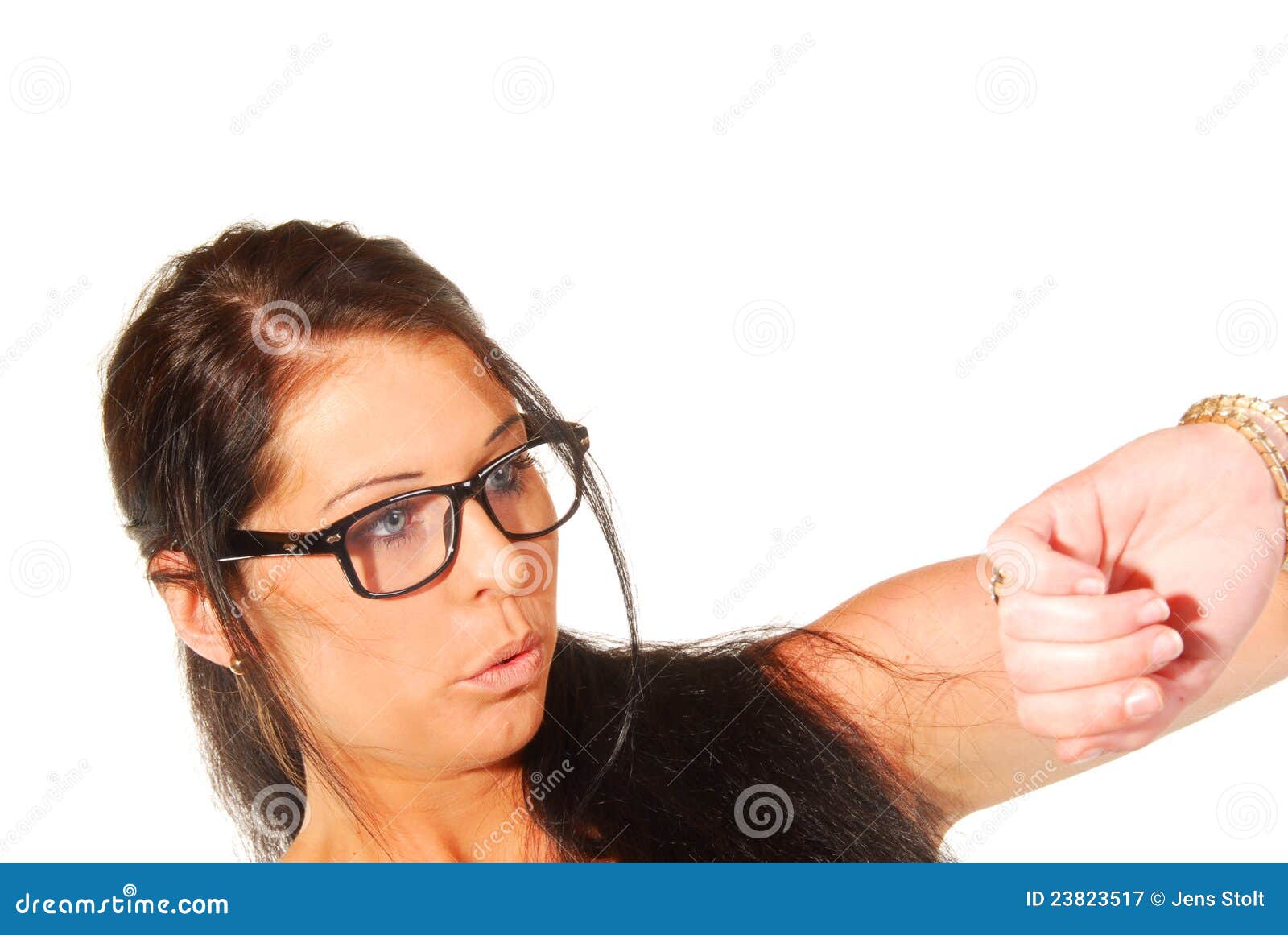 Woman looking at her watch stock image. Image of professional - 23823517