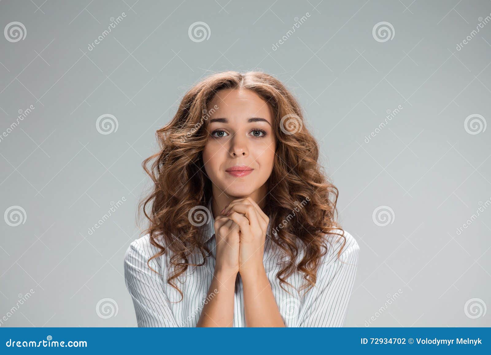 Woman is Looking Imploring Over Gray Background Stock Photo - Image of ...