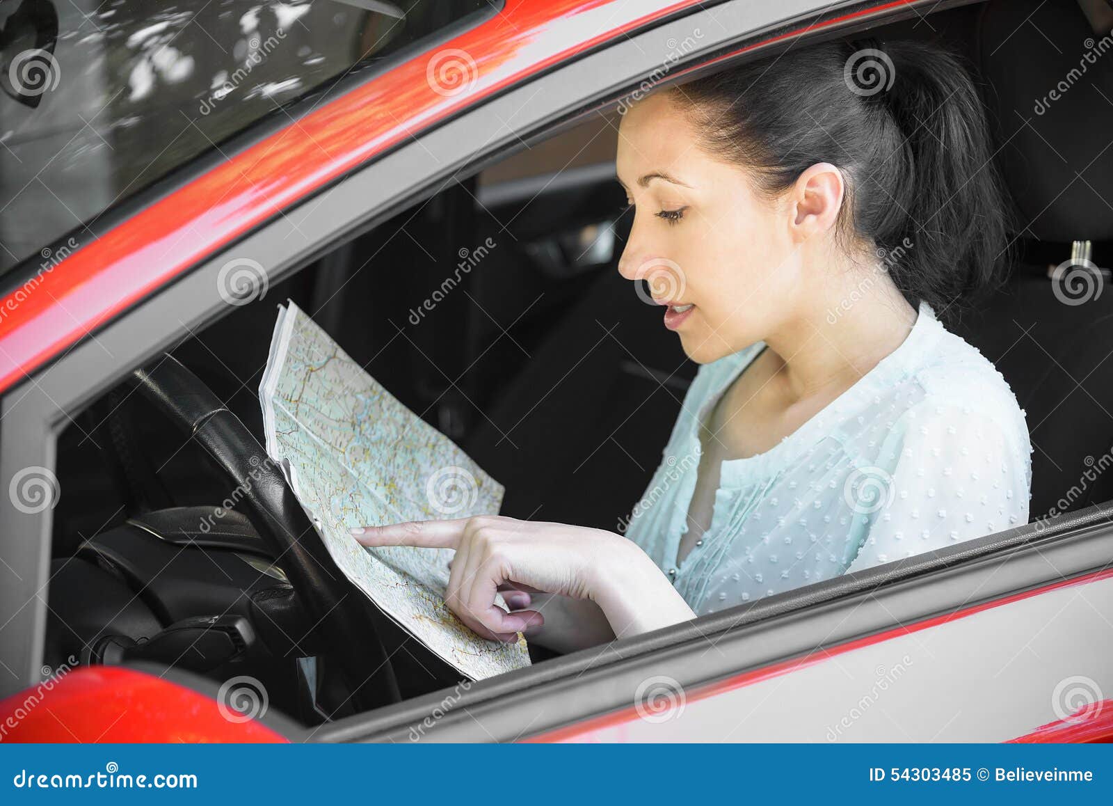 Woman looking at map stock image. Image of female, navigation - 54303485
