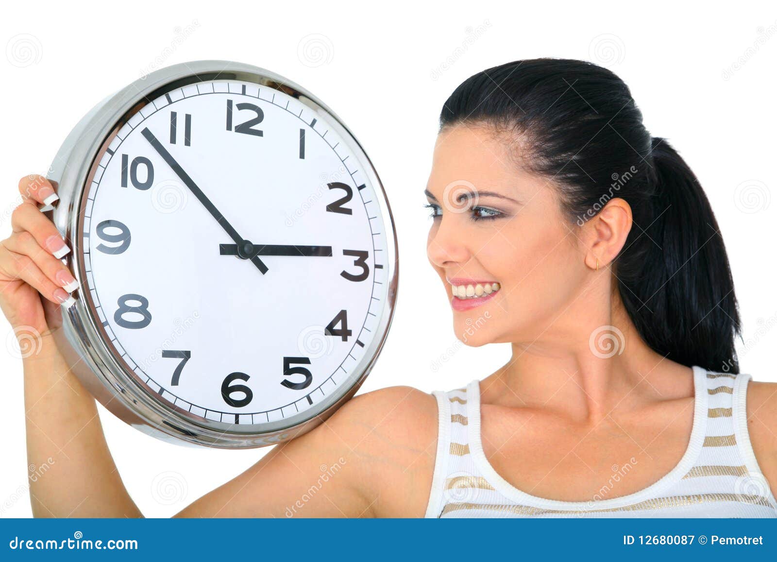 Woman Looking Over Clock stock image. Image of brunette - 12680087