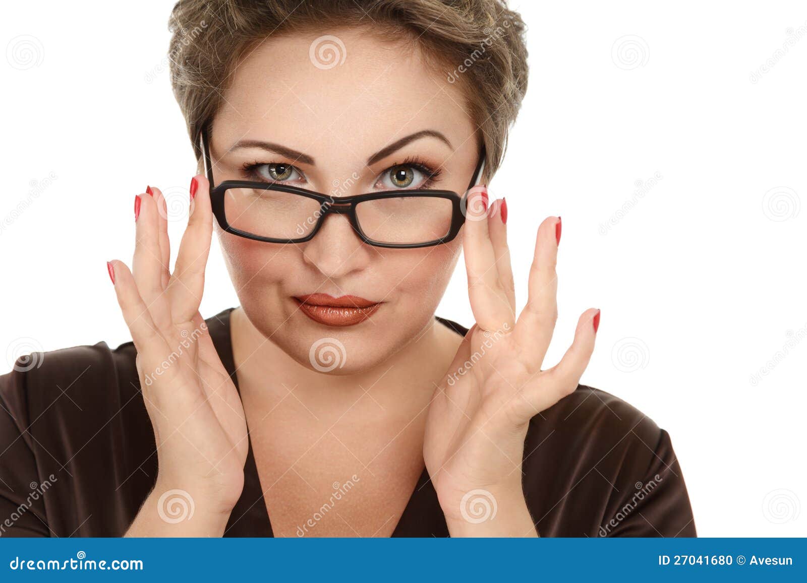 Woman looking over glasses stock photo. Image of adult - 27041680