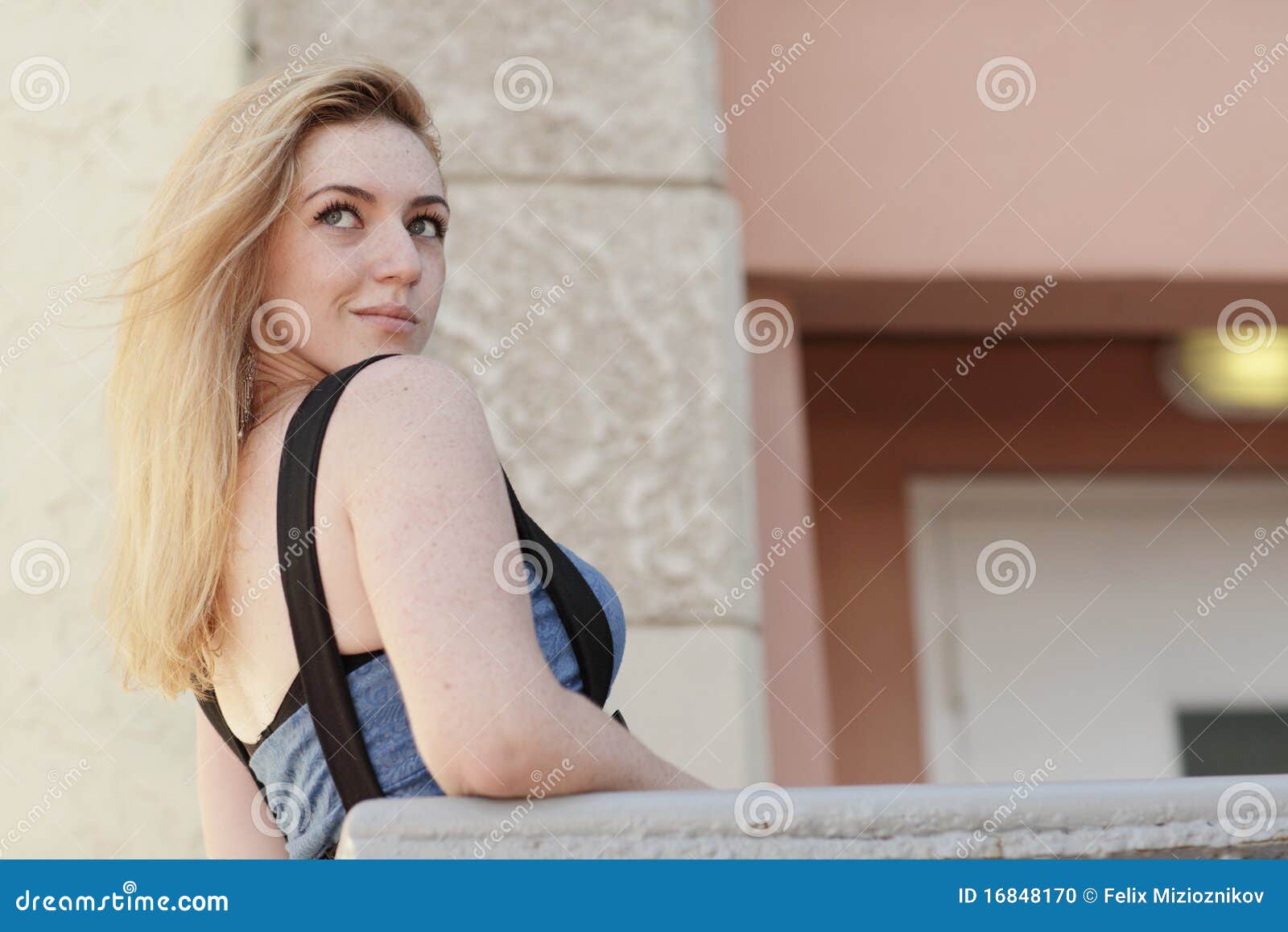 Woman Looking Over Her Shoulder Stock Photo - Image of shoulder ...
